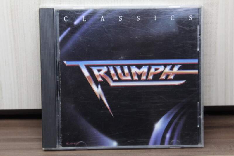 CD Triumph - Classics (Made in USA) - Achados e Descobertas